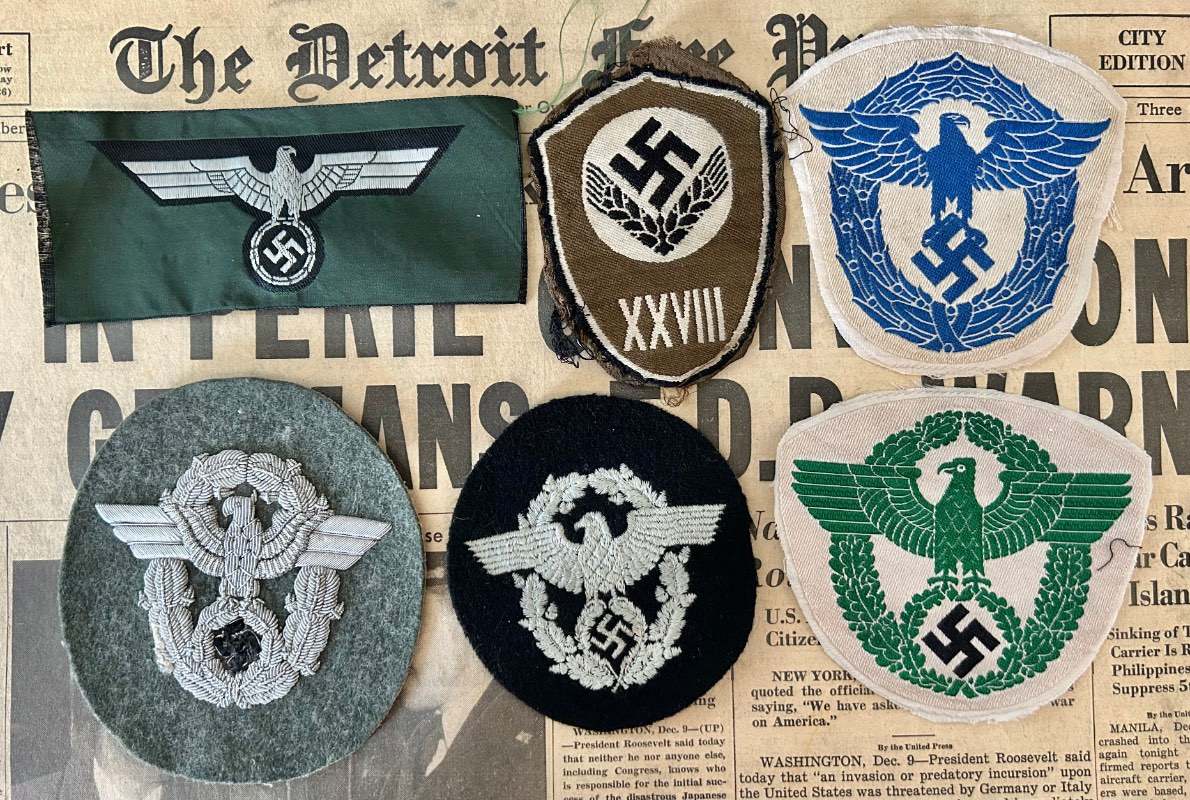 Advertised as reproduction various sleeve insignia - TR BADGES ...
