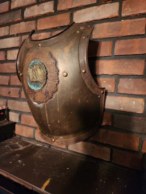 Seeking help identifying these items: breastplate, sword and steel ...